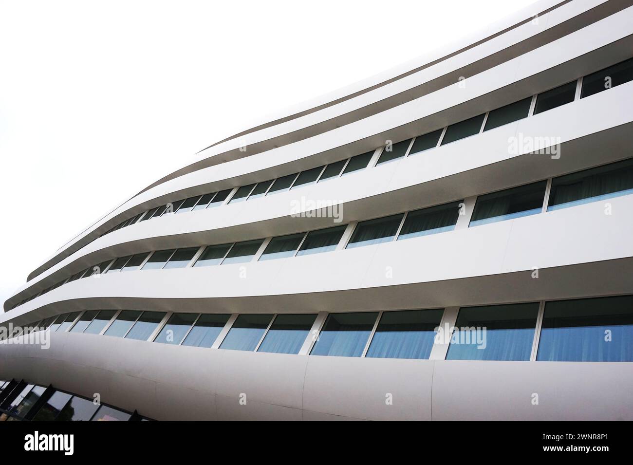 Facade of a modern building of rounded shape in Wroclaw as modern ...