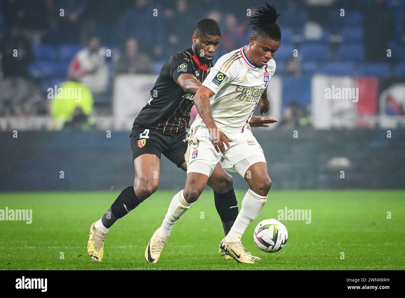 Kevin DANSO of Lens and Gift ORBAN of Lyon during the French ...