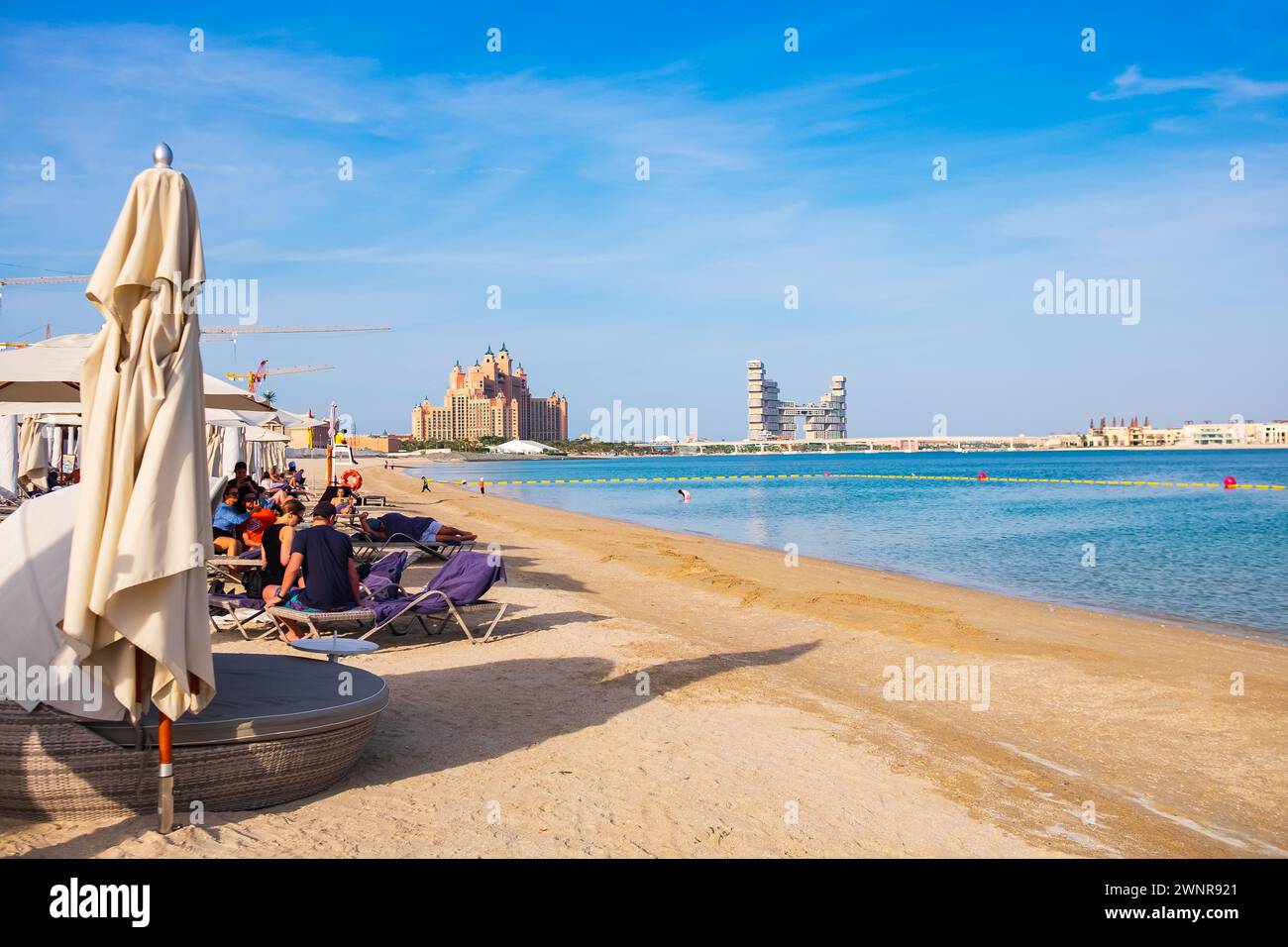 A landscape view of Dubai beach and sea in summer, famous building. UAE ...
