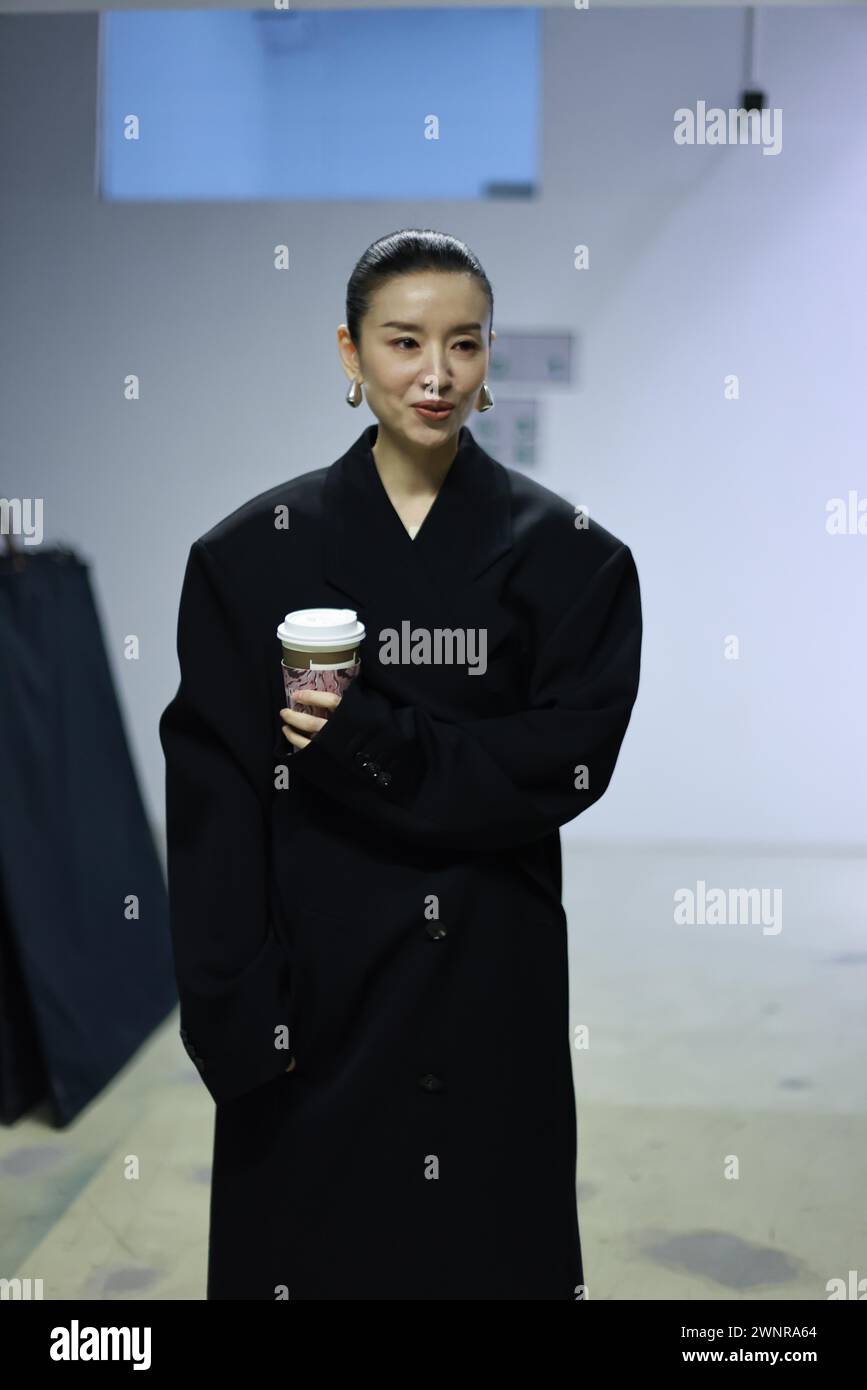 Chinese actress and dancer Dong Jie attends an activity in Shanghai ...