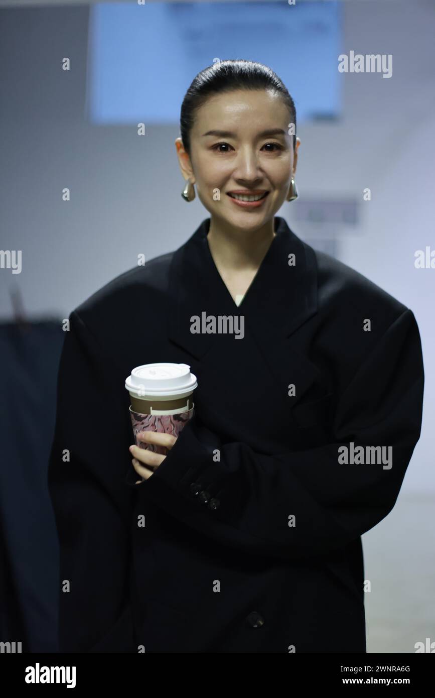 Chinese actress and dancer Dong Jie attends an activity in Shanghai ...