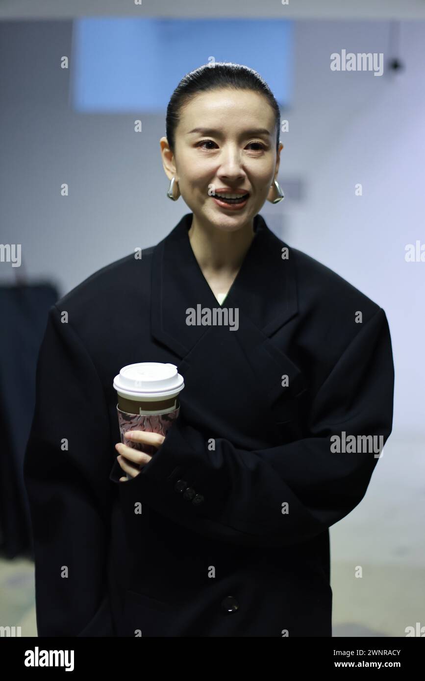 Chinese actress and dancer Dong Jie attends an activity in Shanghai ...