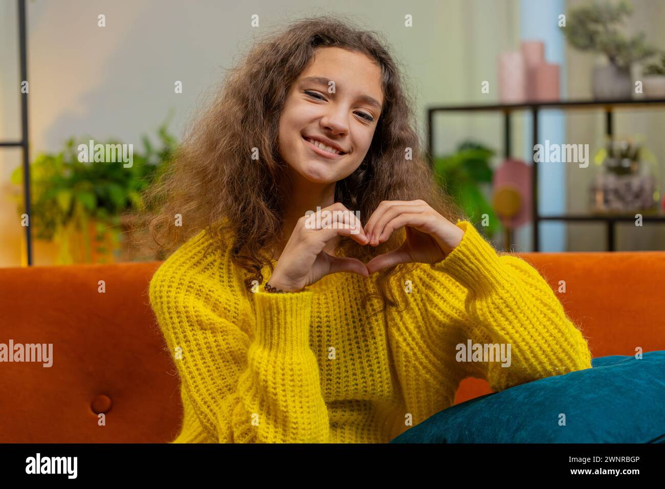 I love you. Caucasian child kid girl makes symbol of love, showing ...