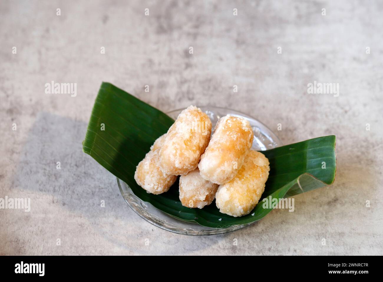 Kue Getas Ketan or Gemblong, Sticky Rice Cake with Melted Sugar Coating ...