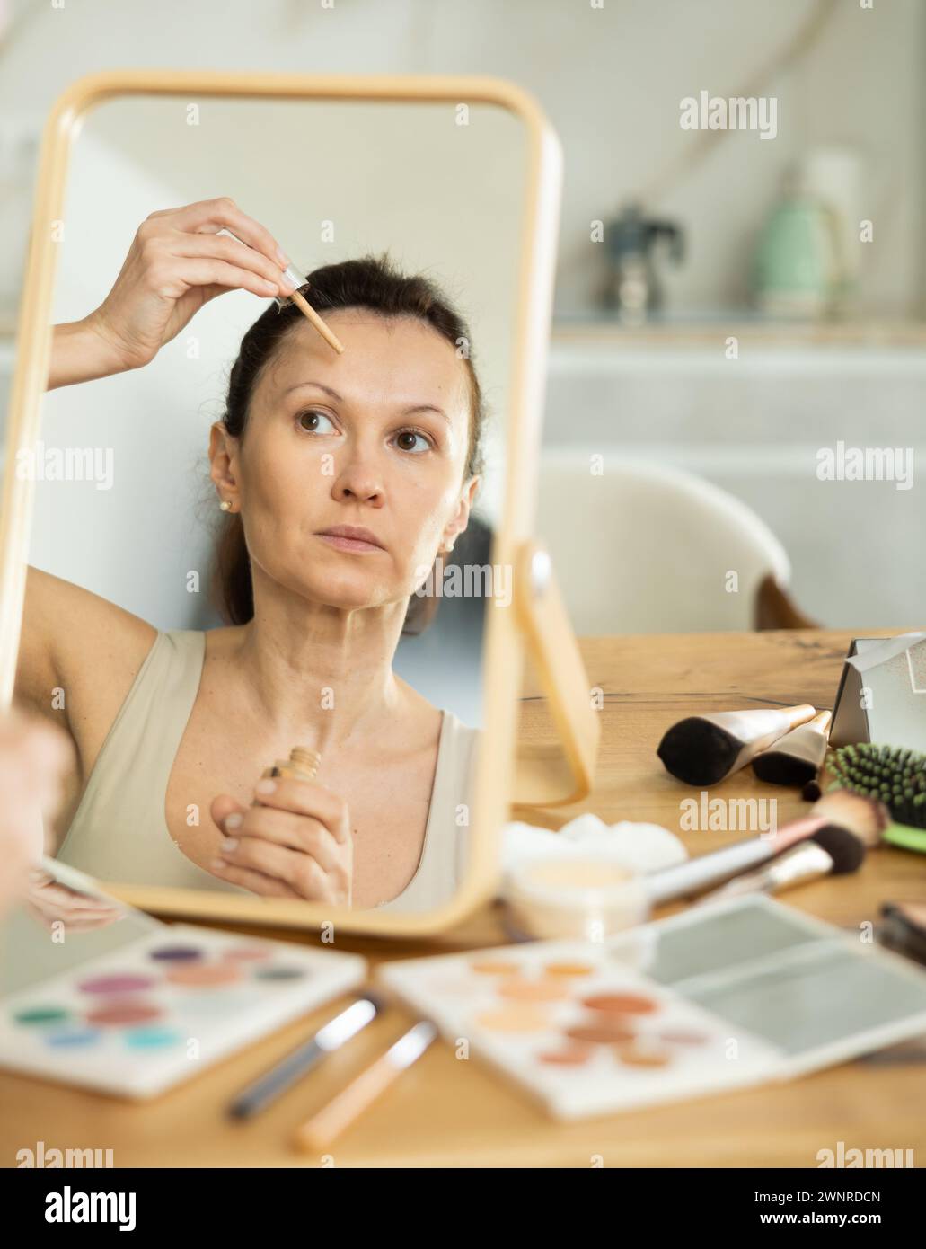 Beauty 40s woman foundation make up hi-res stock photography and images ...