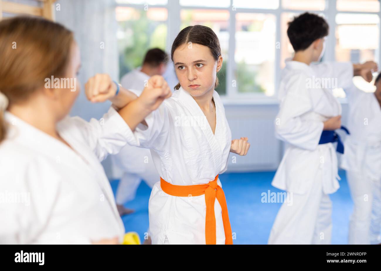 Two girls training judo techniques in studio Stock Photo - Alamy