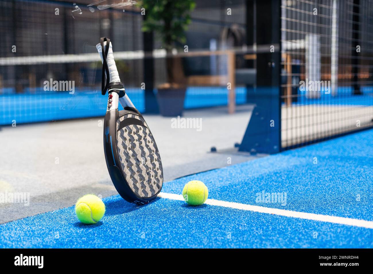 Paddle objects on blue turf Stock Photo - Alamy