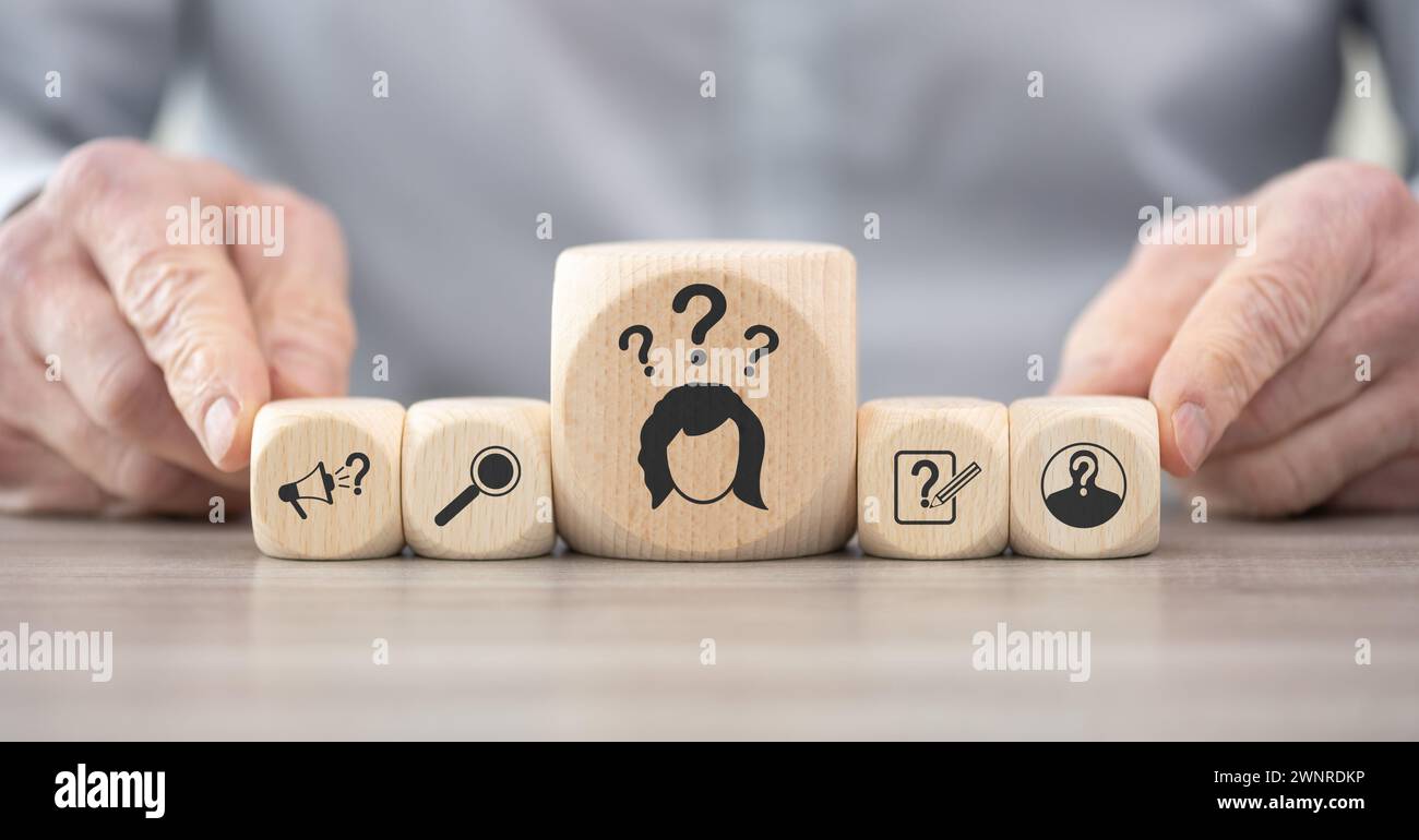 Wooden blocks with symbol of question concept Stock Photo - Alamy