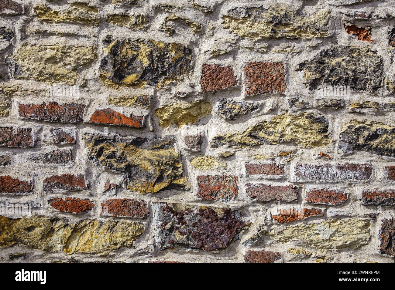 Vintage rustic bricks and stones create the texture of the stone ...