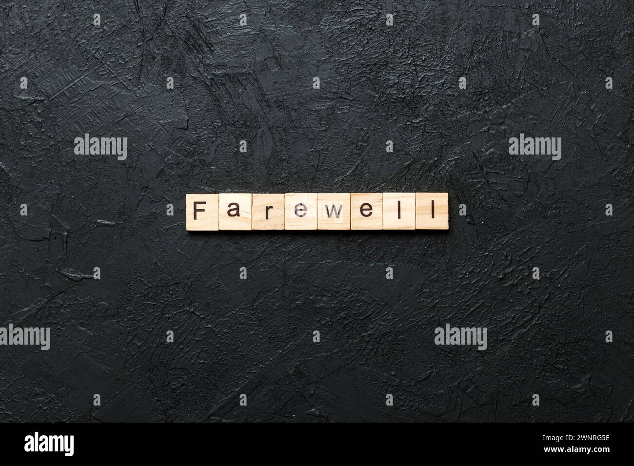 farewell word written on wood block. farewell text on table, concept ...