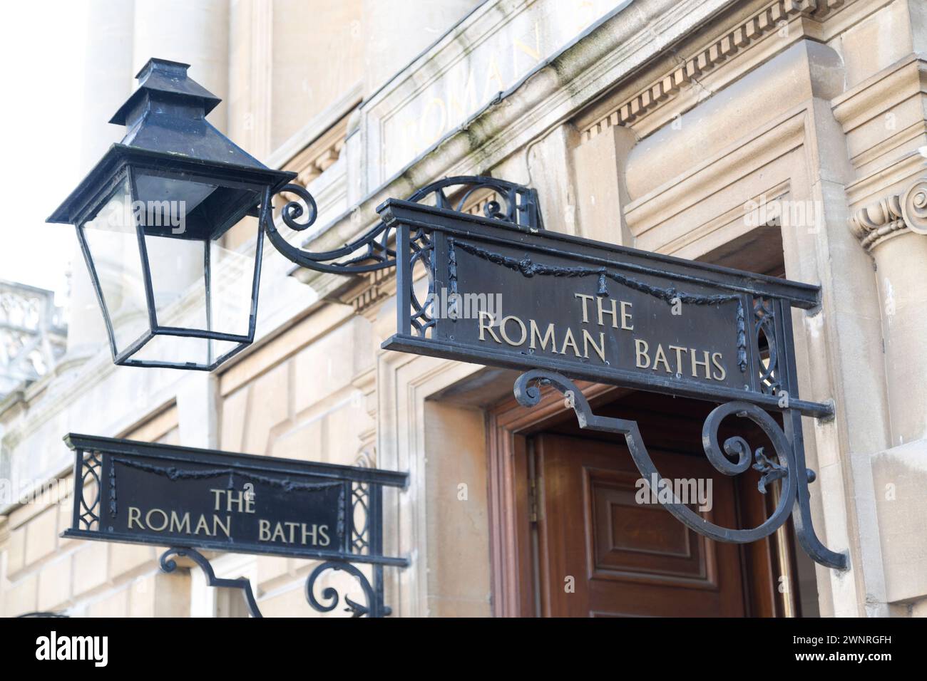 UK, Bath, The historic roman baths entrance signpost Stock Photo - Alamy