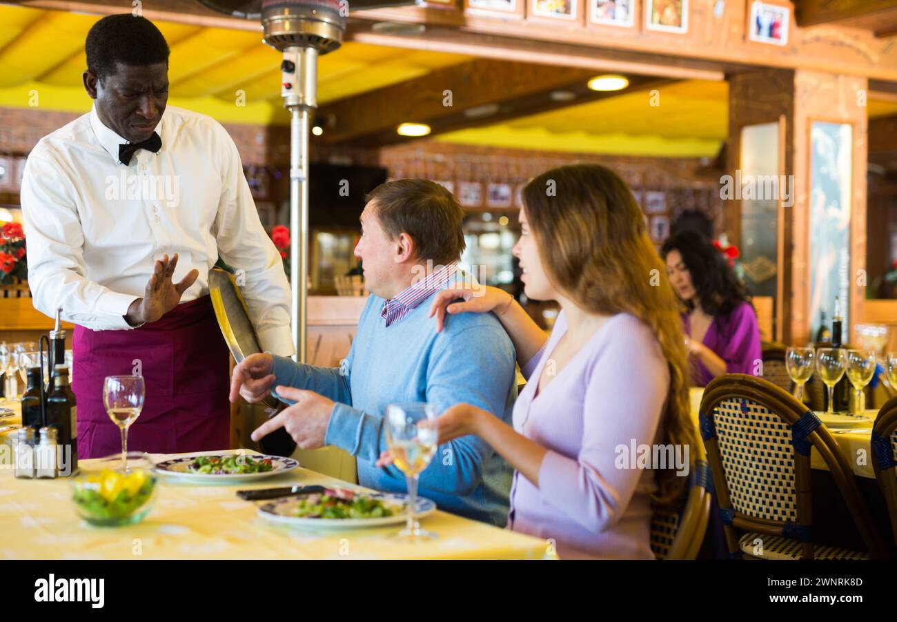Angry waiter menu hi-res stock photography and images - Alamy
