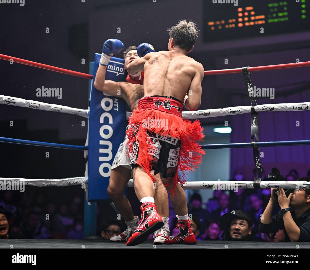 Kazuki Nakajima (red) and Mugicha Nakagawa (white) compete during their ...