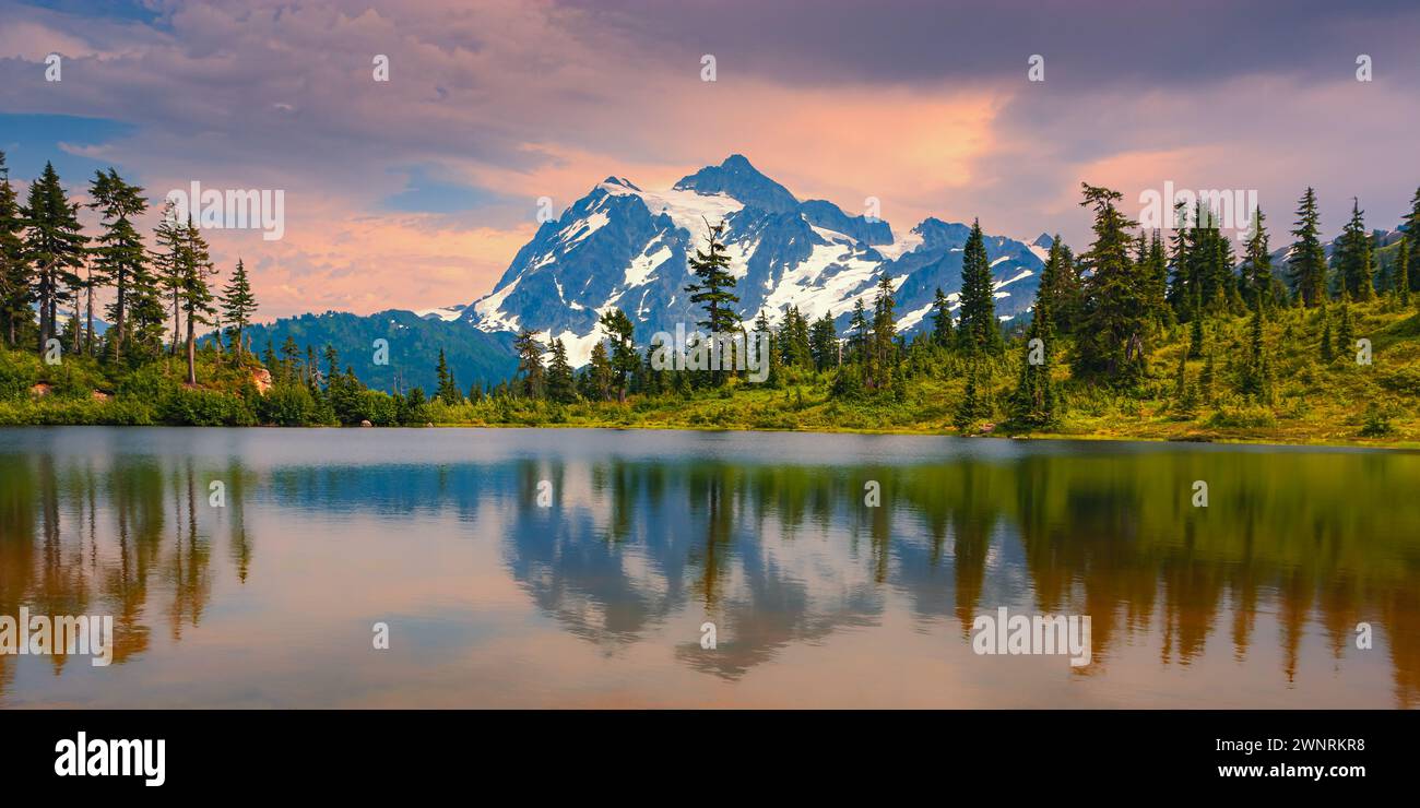A wide 2:1 photo from sunset light at Mount Shuksan and his reflection ...