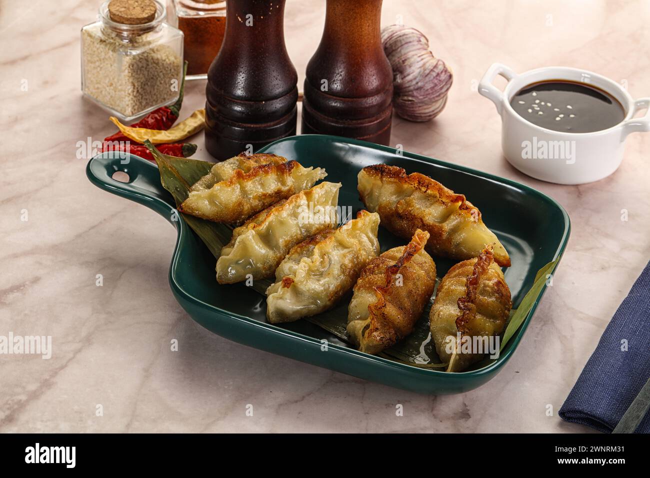 Fried Japanese stuffed dumplings - Gyoza with meat Stock Photo - Alamy
