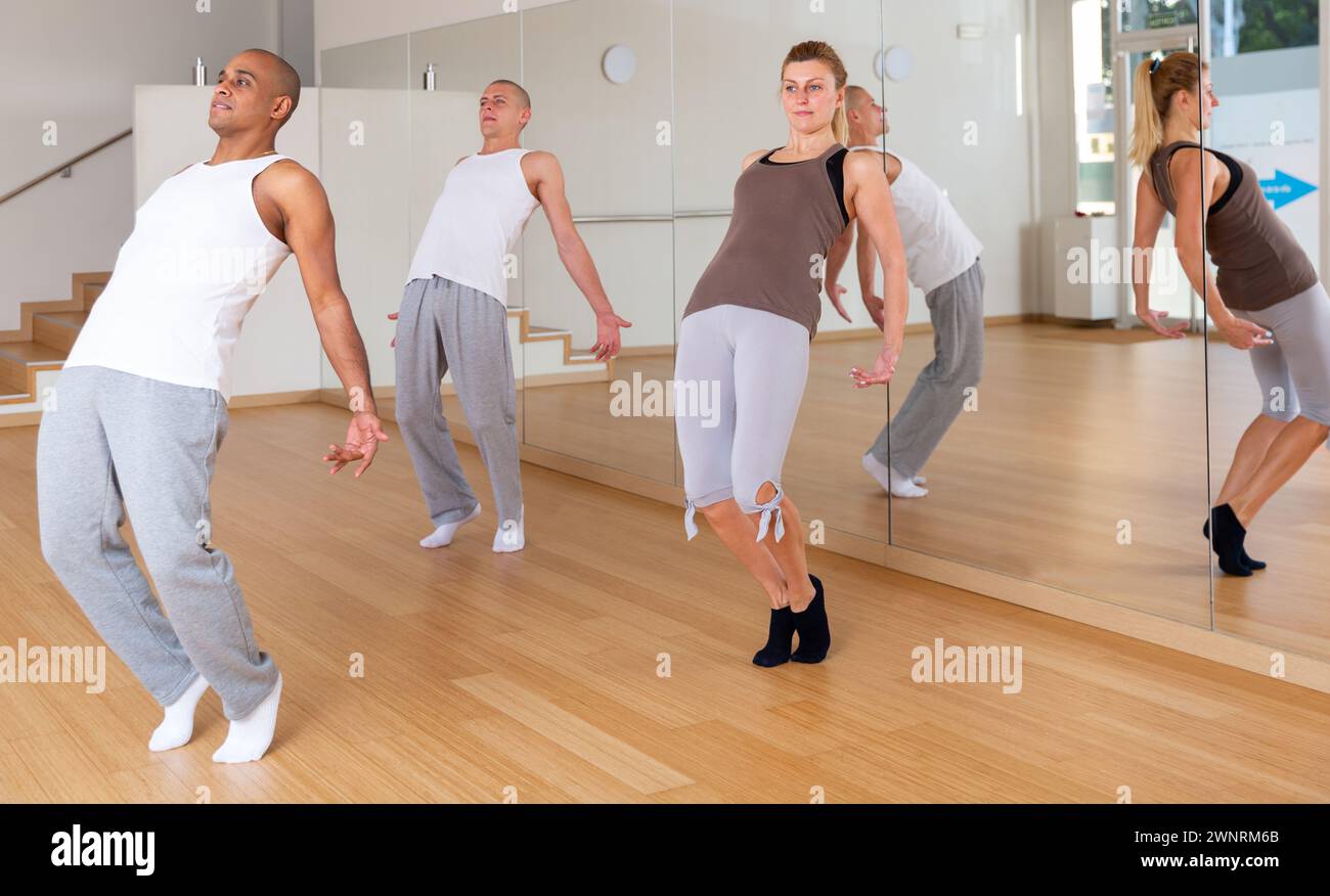 Group of activity people practicing dance techniques Stock Photo - Alamy