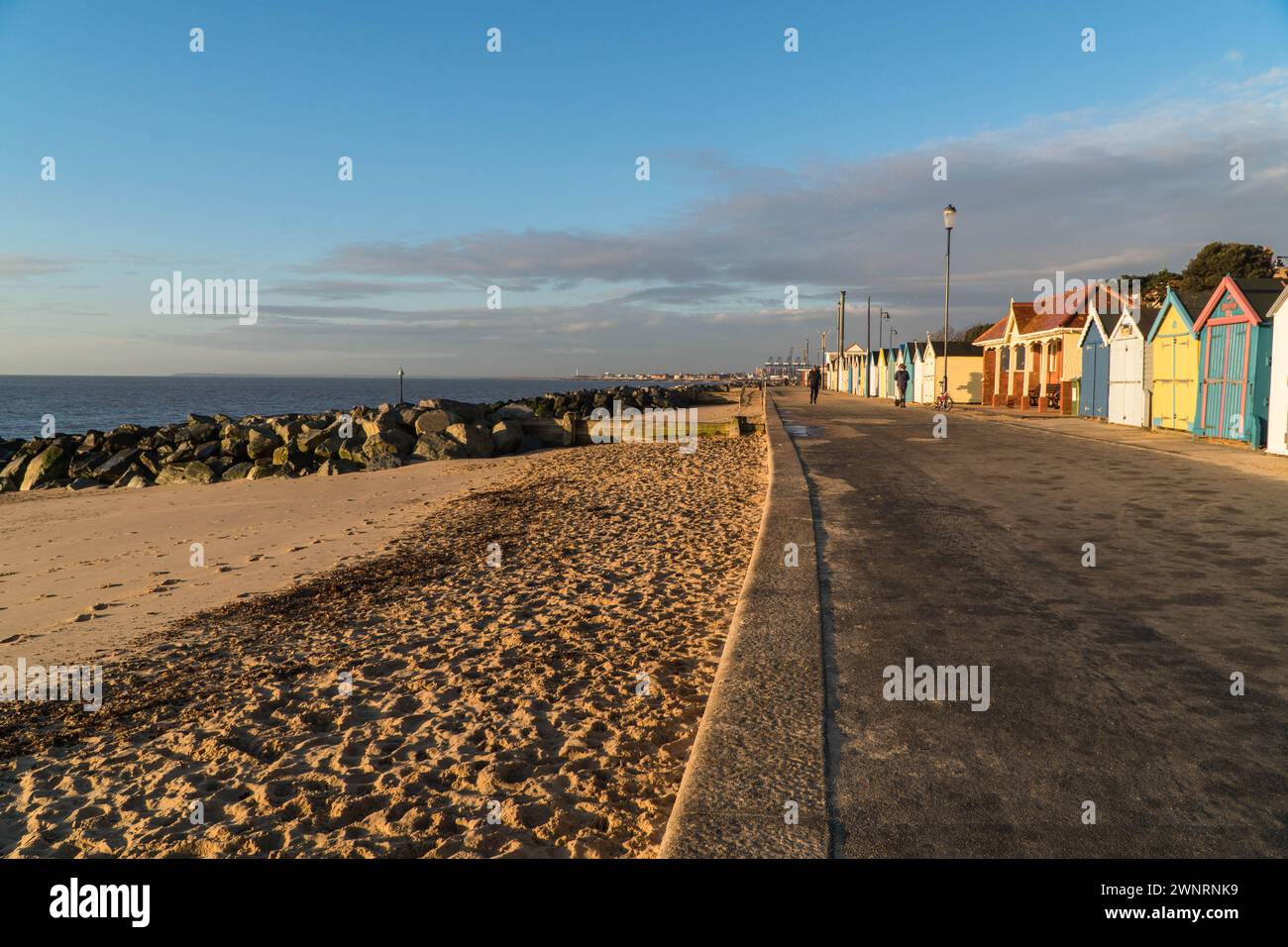 Sunrise over Felixstowe beach and promenade which leads to Landguard ...