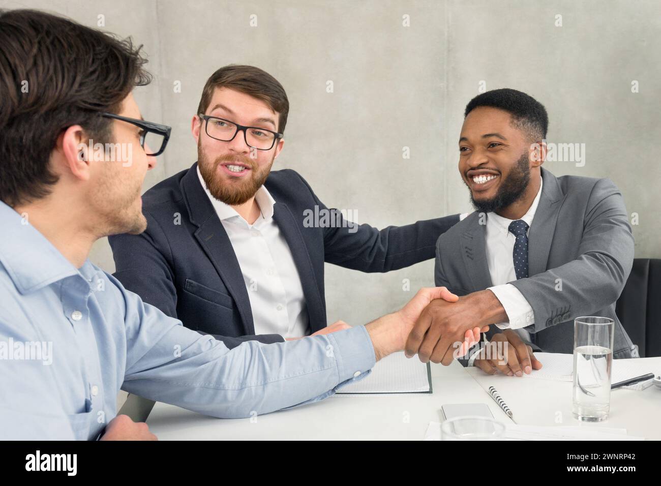First meeting shaking hands hi-res stock photography and images - Alamy