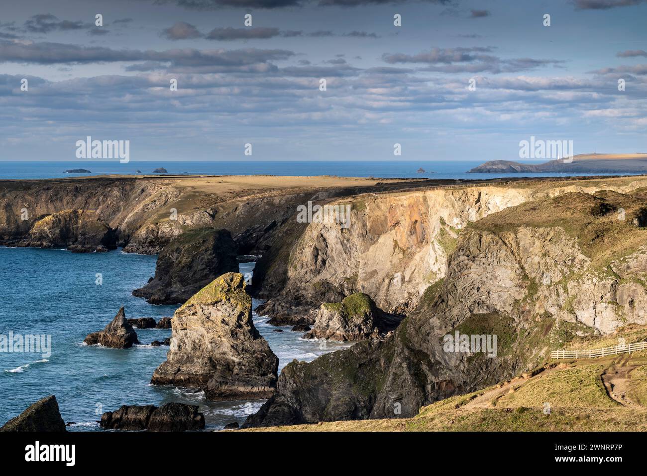 Sunshine over the spectacular rugged sea stacks at Bedruthan Steps on ...
