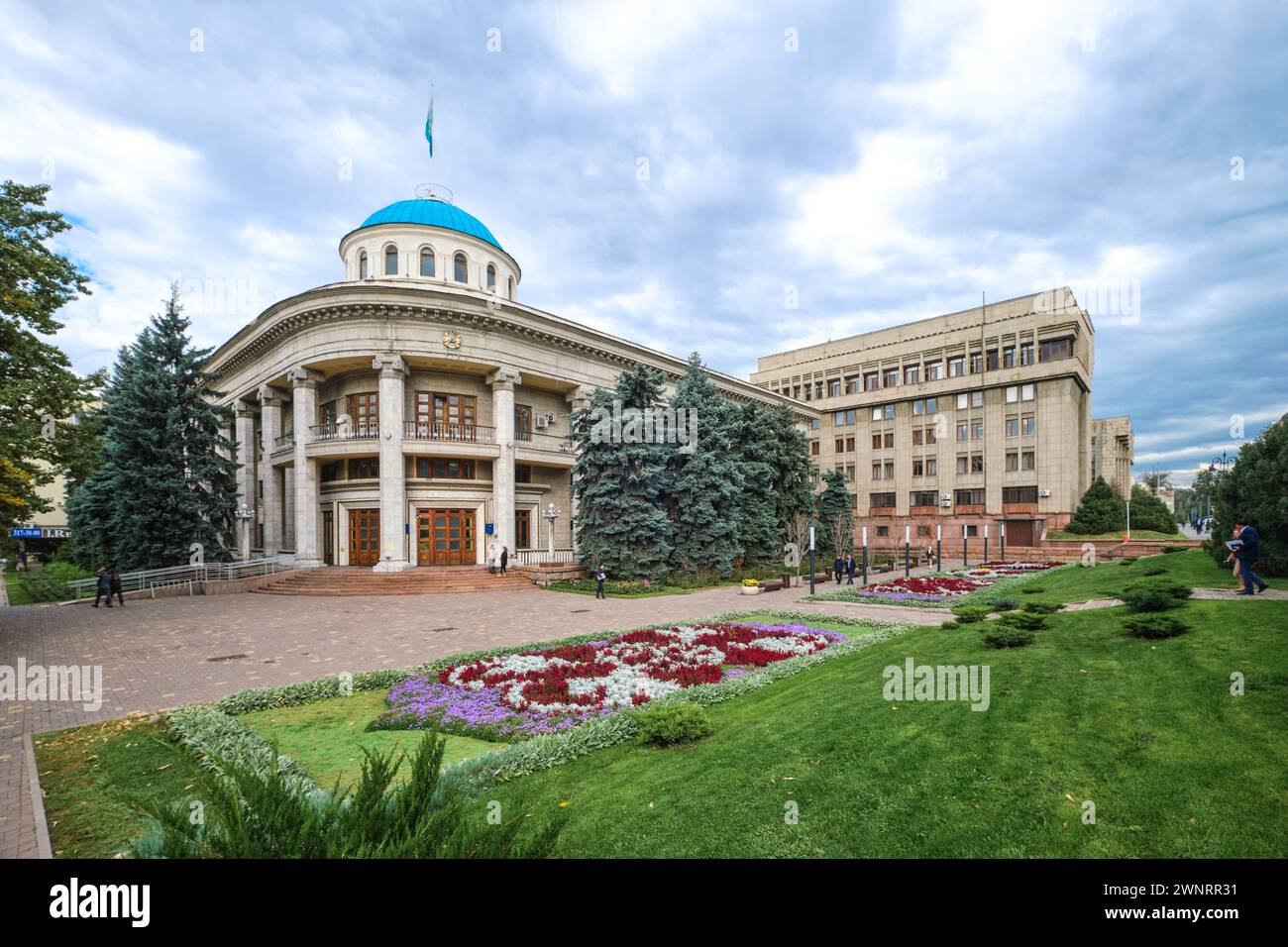 The curved, traditional, blue domed Akimat G. Almaty government building. In Almaty, Kazakhstan ...
