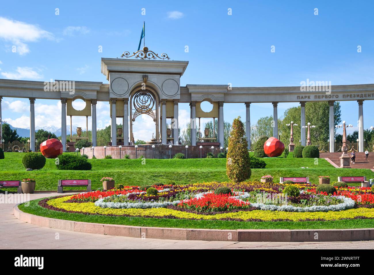 The grand front entrance with large, arched gate and colorful ...