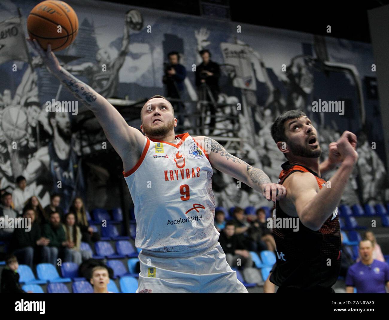 DNIPRO, UKRAINE - MARCH 2, 2024 - Forward Dmytro Vasylenko (L) of BC Kryvbas and power forward ...