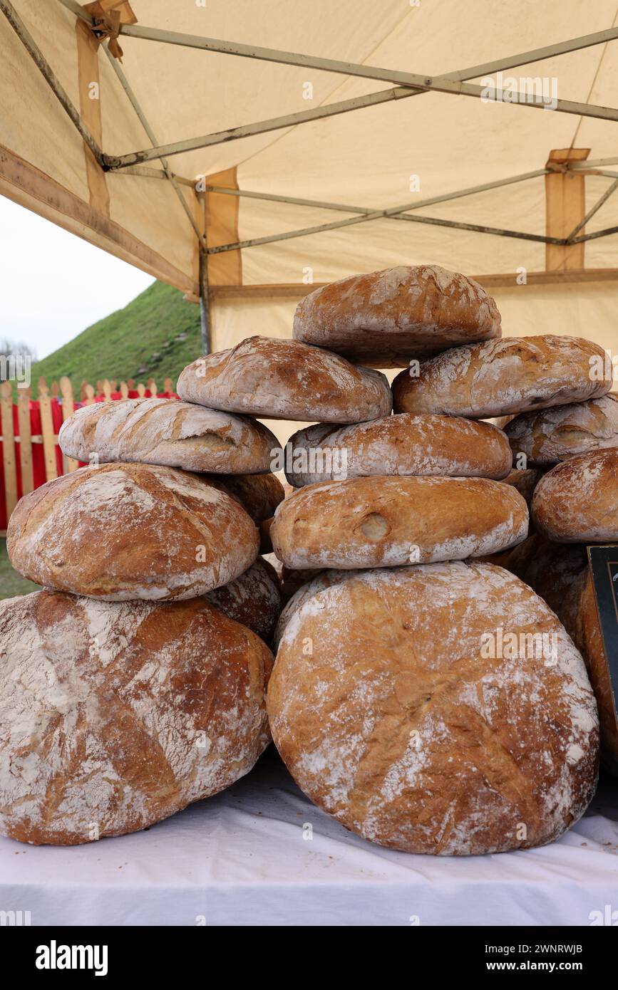 Freshly baked traditional bread at a street stall Stock Photo - Alamy