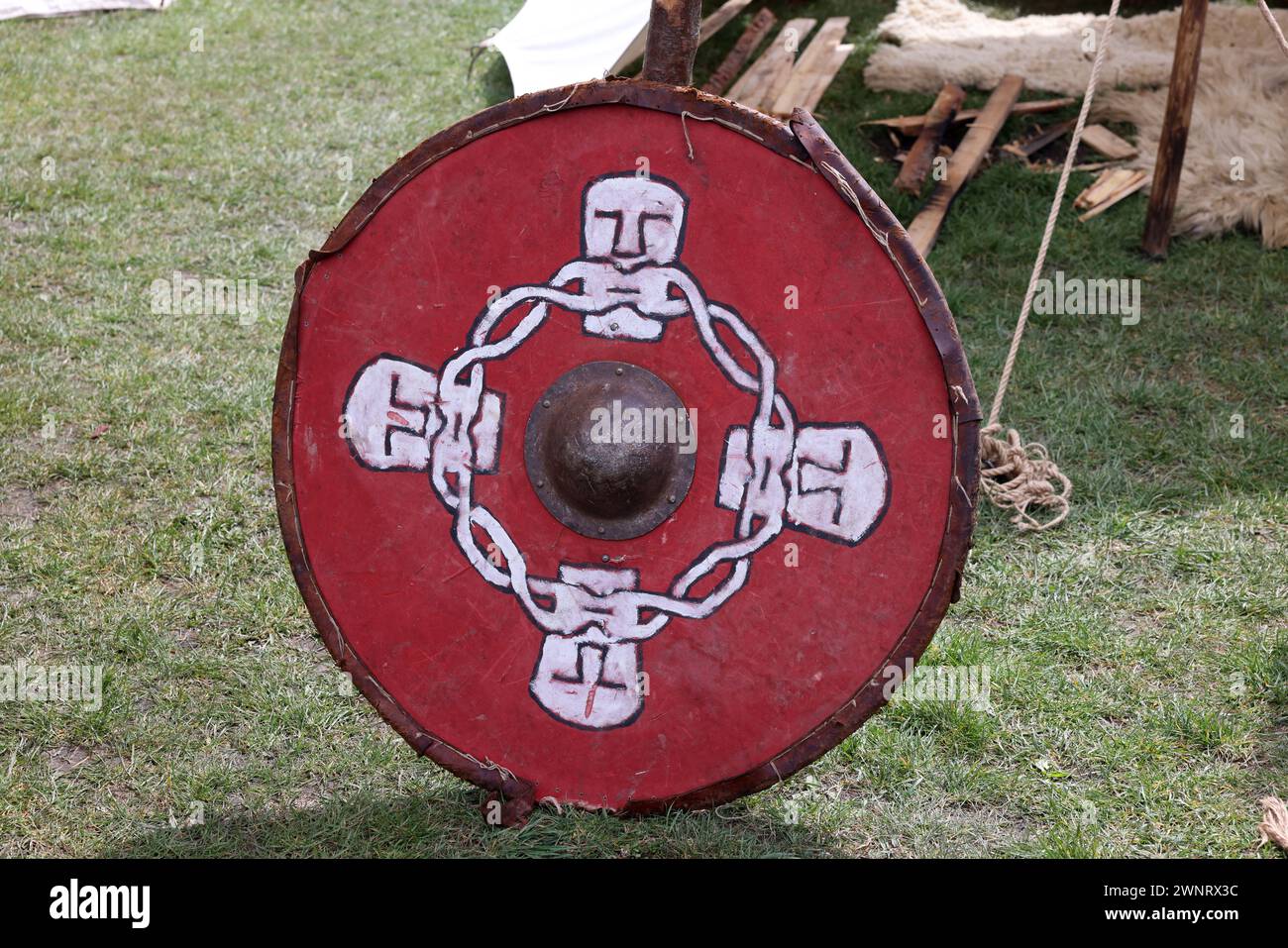 Medieval weapons, shield in knight camp at the festival of historical ...