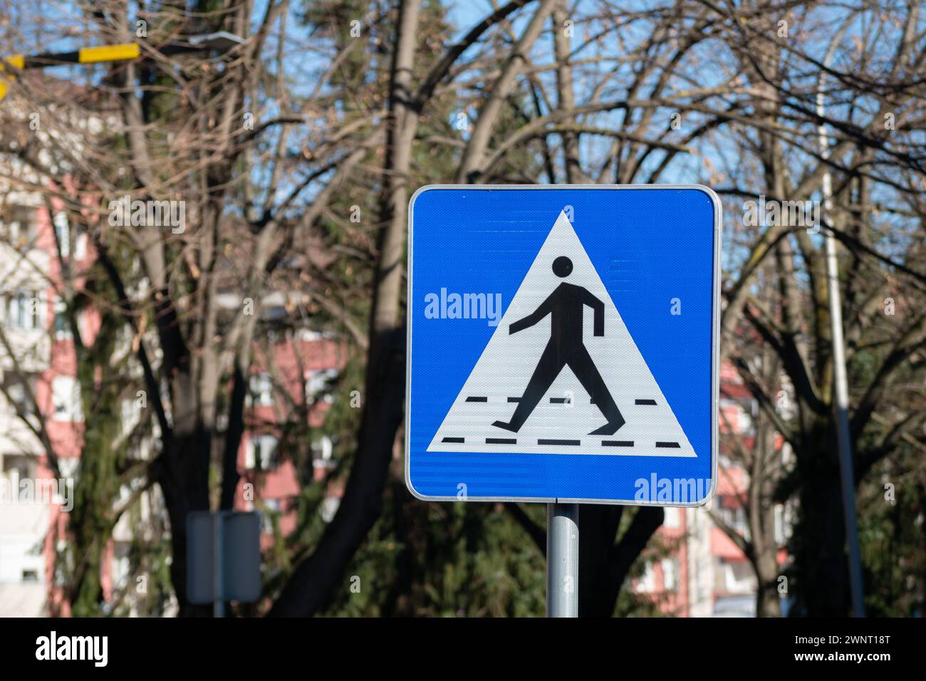 Pedestrian crossing or crosswalk sign close up Stock Photo - Alamy