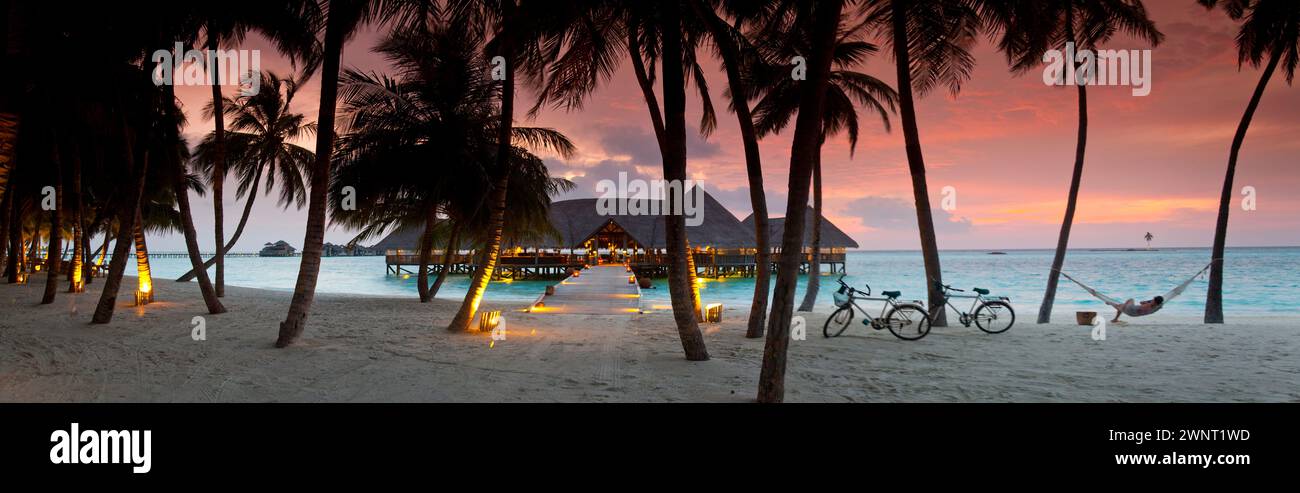 Stilt restaurant in sea behind palm trees atÃ‚Â GiliÃ‚Â LankanfushiÃ‚Â ...