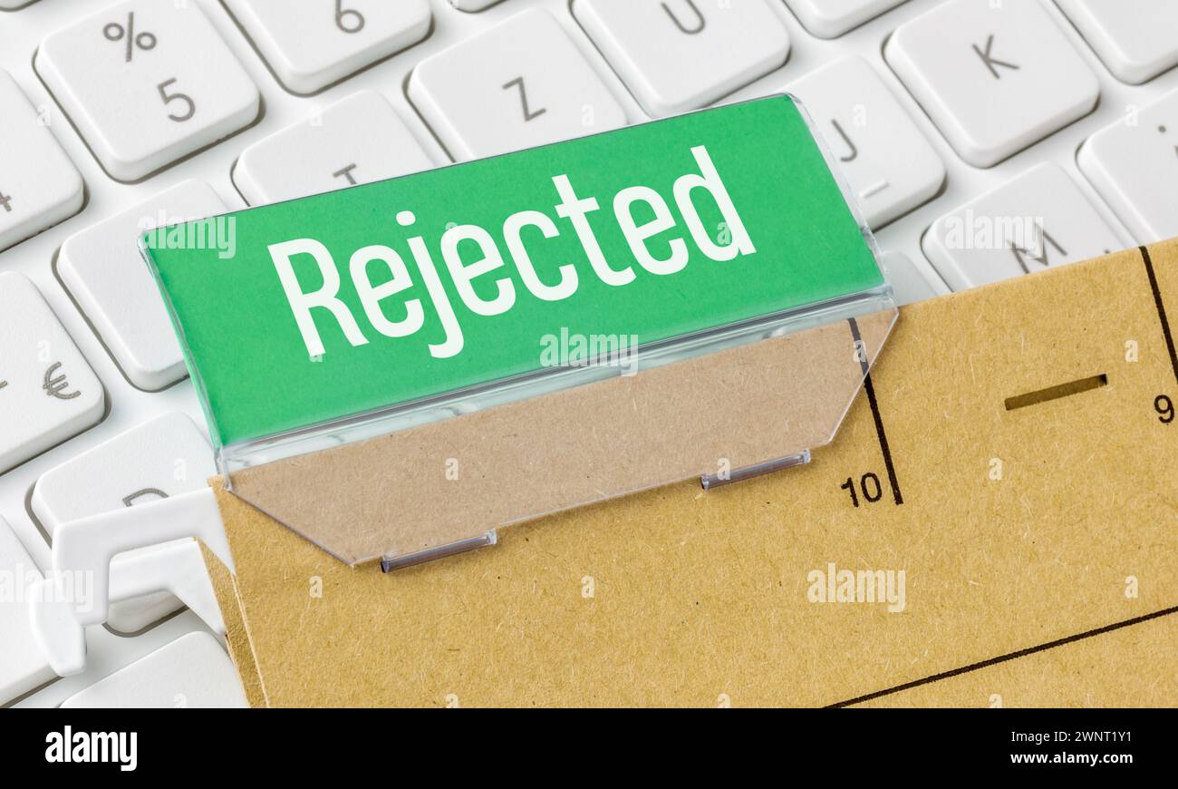 A brown file folder labeled Rejected Stock Photo - Alamy