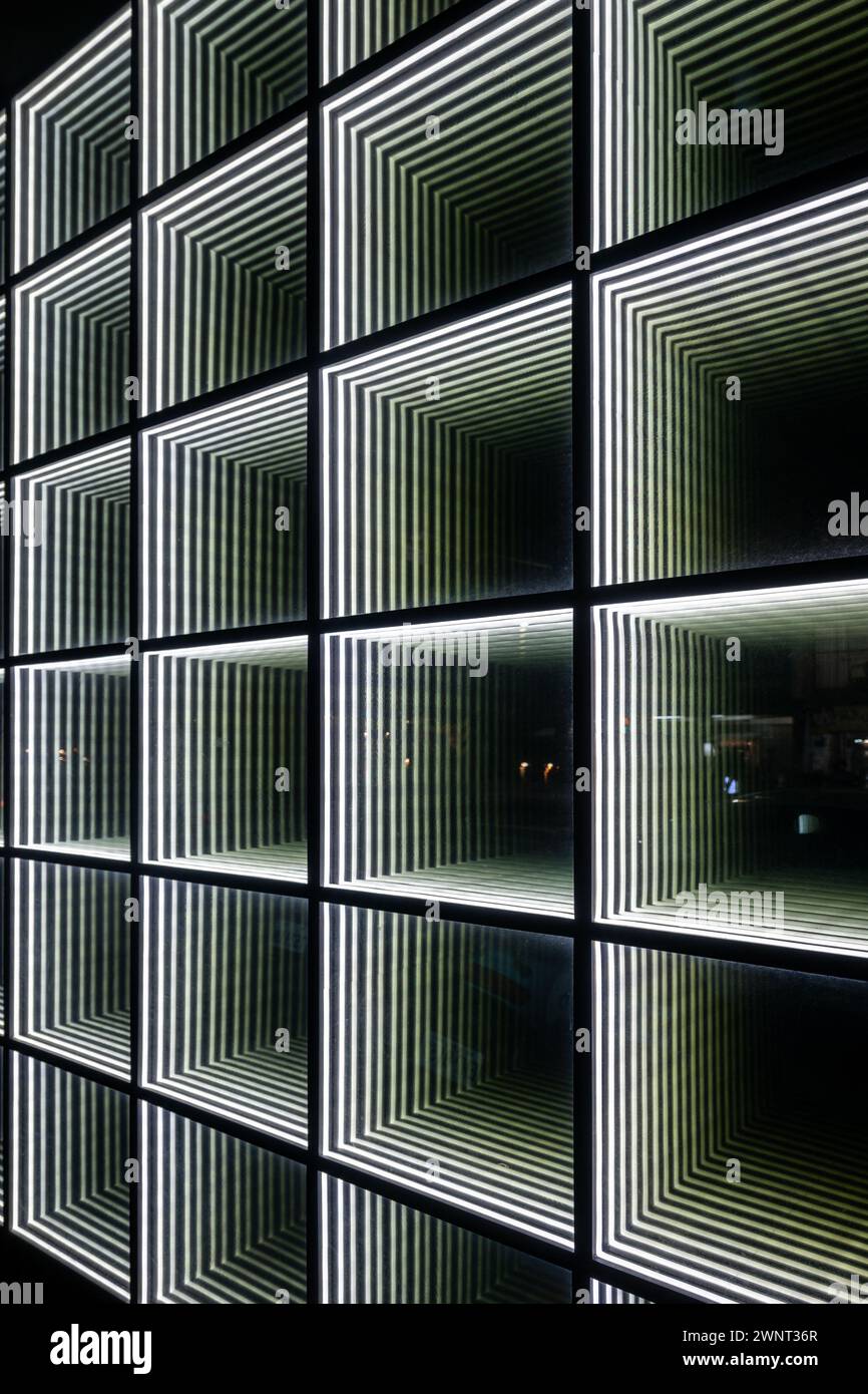 Modern geometric light patterns on wall Stock Photo - Alamy