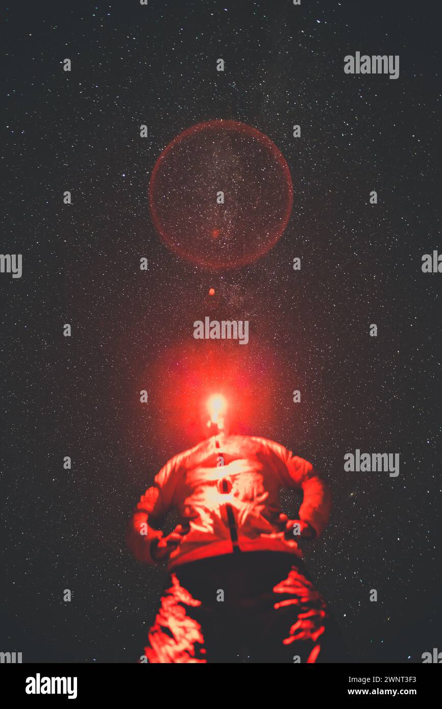 Low angle of man wearing Infrared headlamp at night, starry sky Stock ...