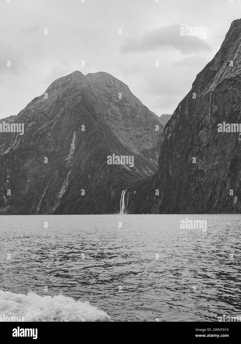 Milford Sound mountain and cascade black and white landscape Stock ... Milford Sound mountain and cascade black and white landscape Stock ...