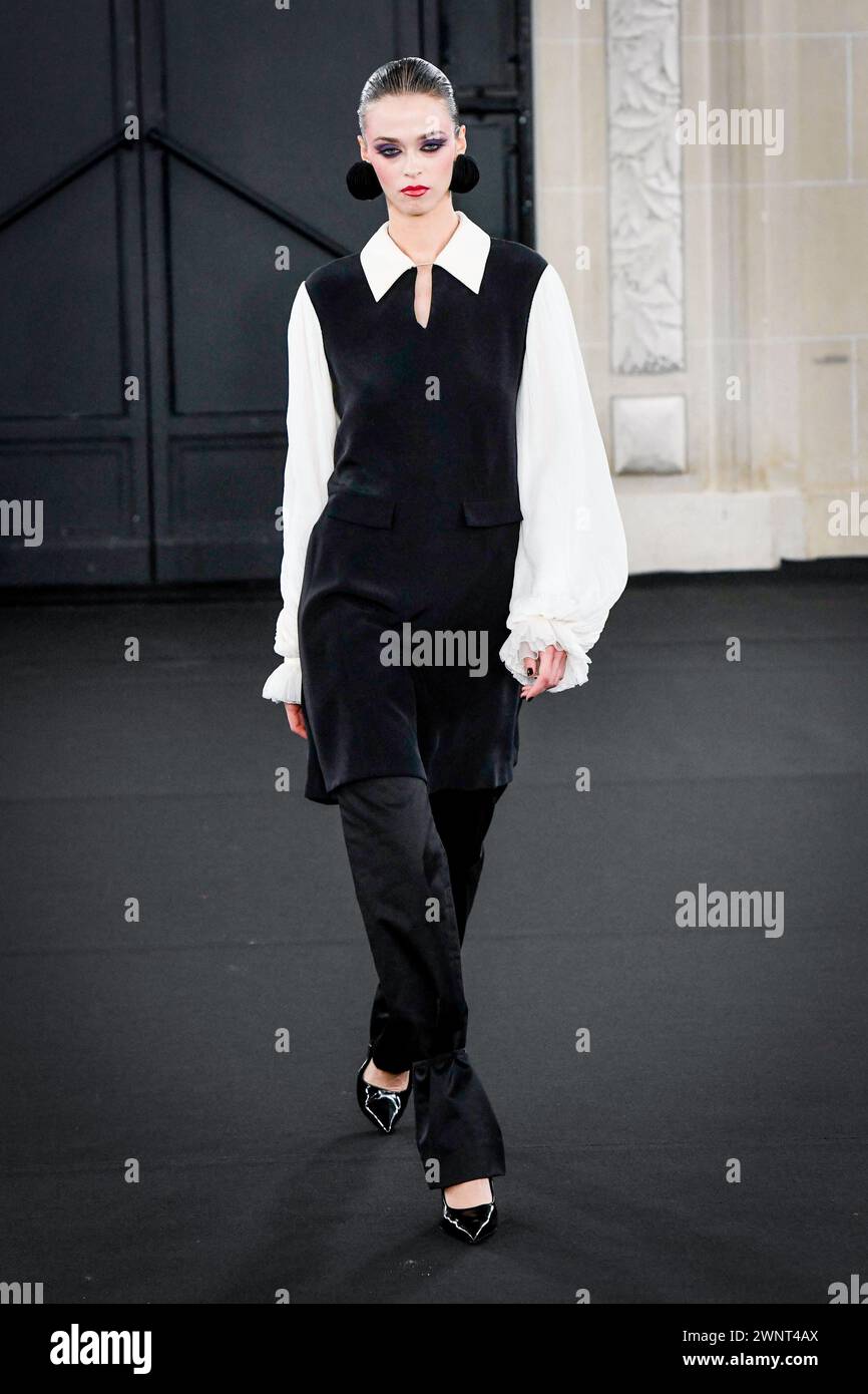 Paris, France. 03rd Mar, 2024. A model walks the runway during the ...