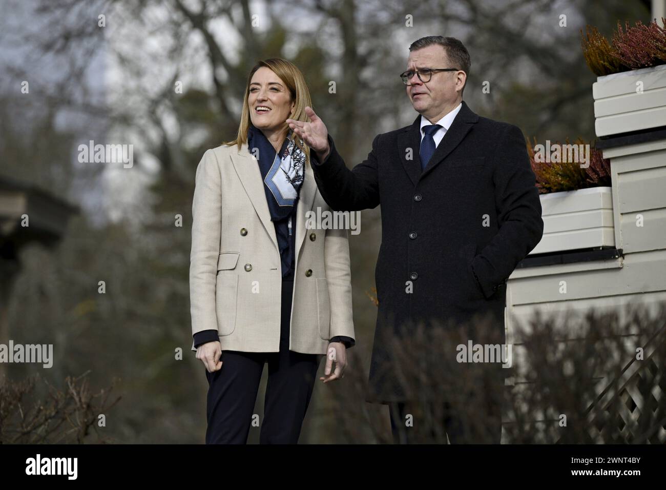 Finnish Prime Minister Petteri Orpo, right, and European Parliament President Roberta Metsola ...