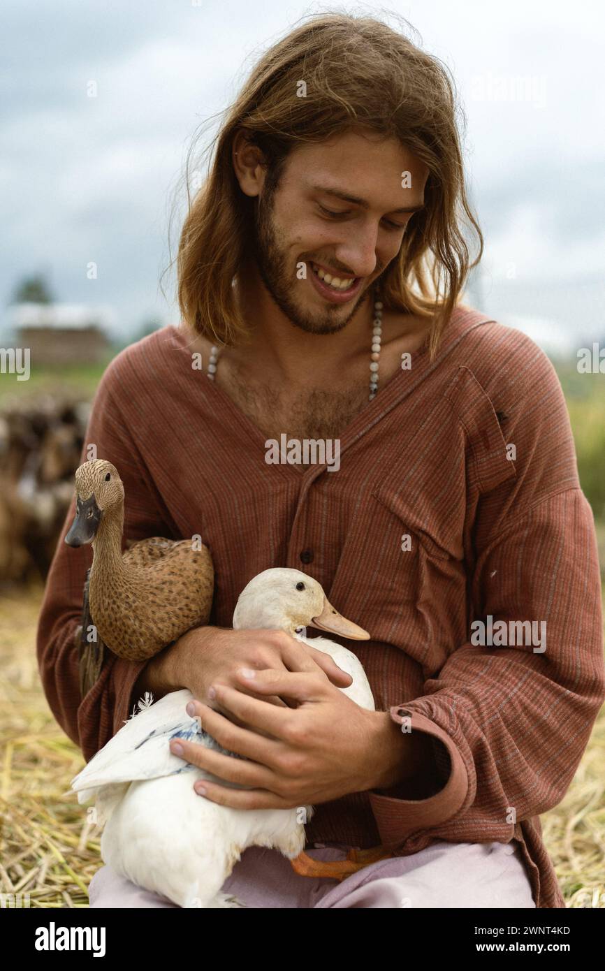 Young bird in hands man hi-res stock photography and images - Alamy