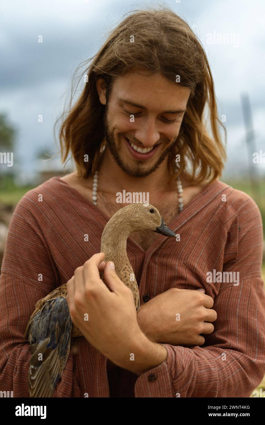 Person holds duck in hi-res stock photography and images - Alamy