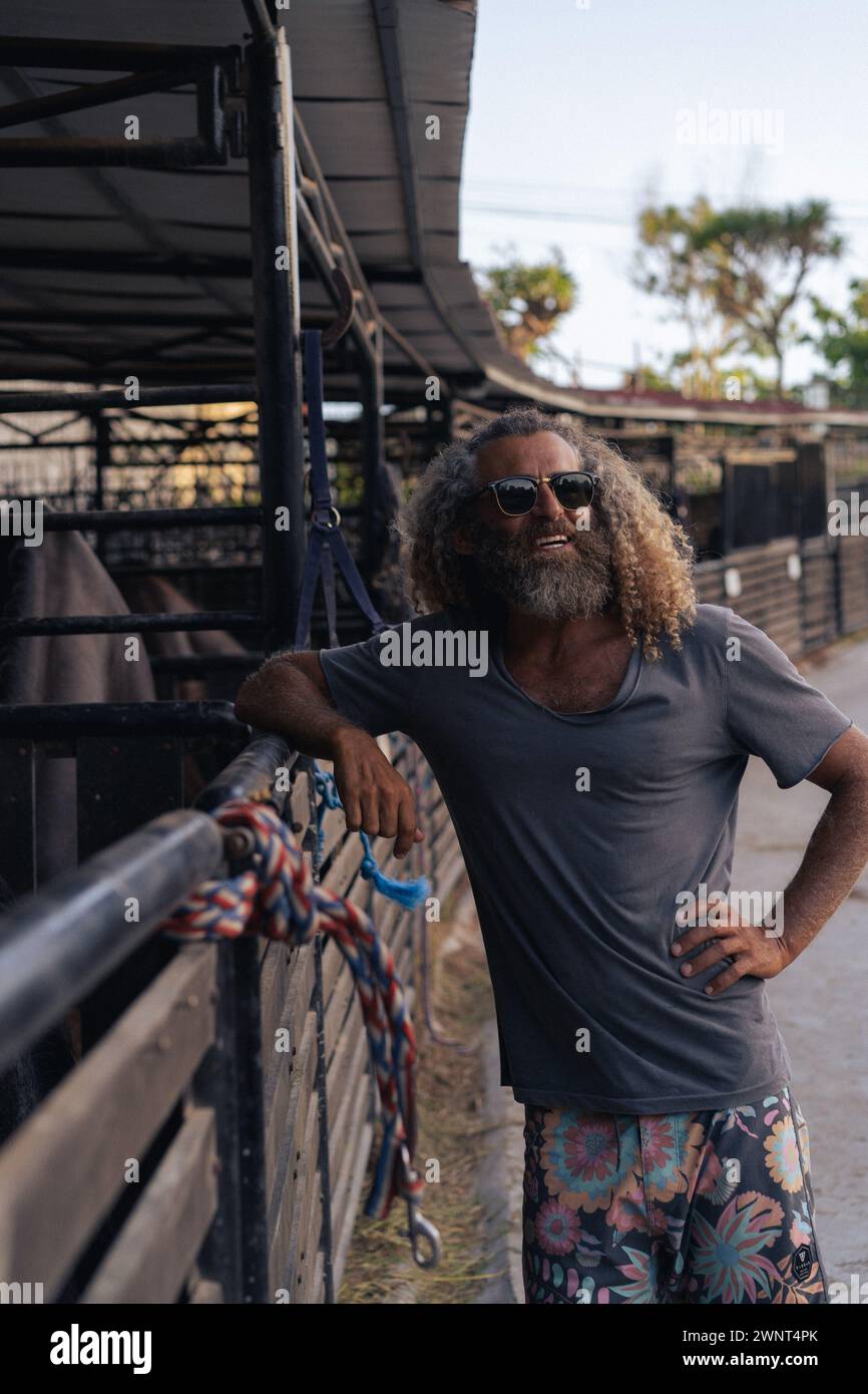Man and horse in stall hi-res stock photography and images - Alamy