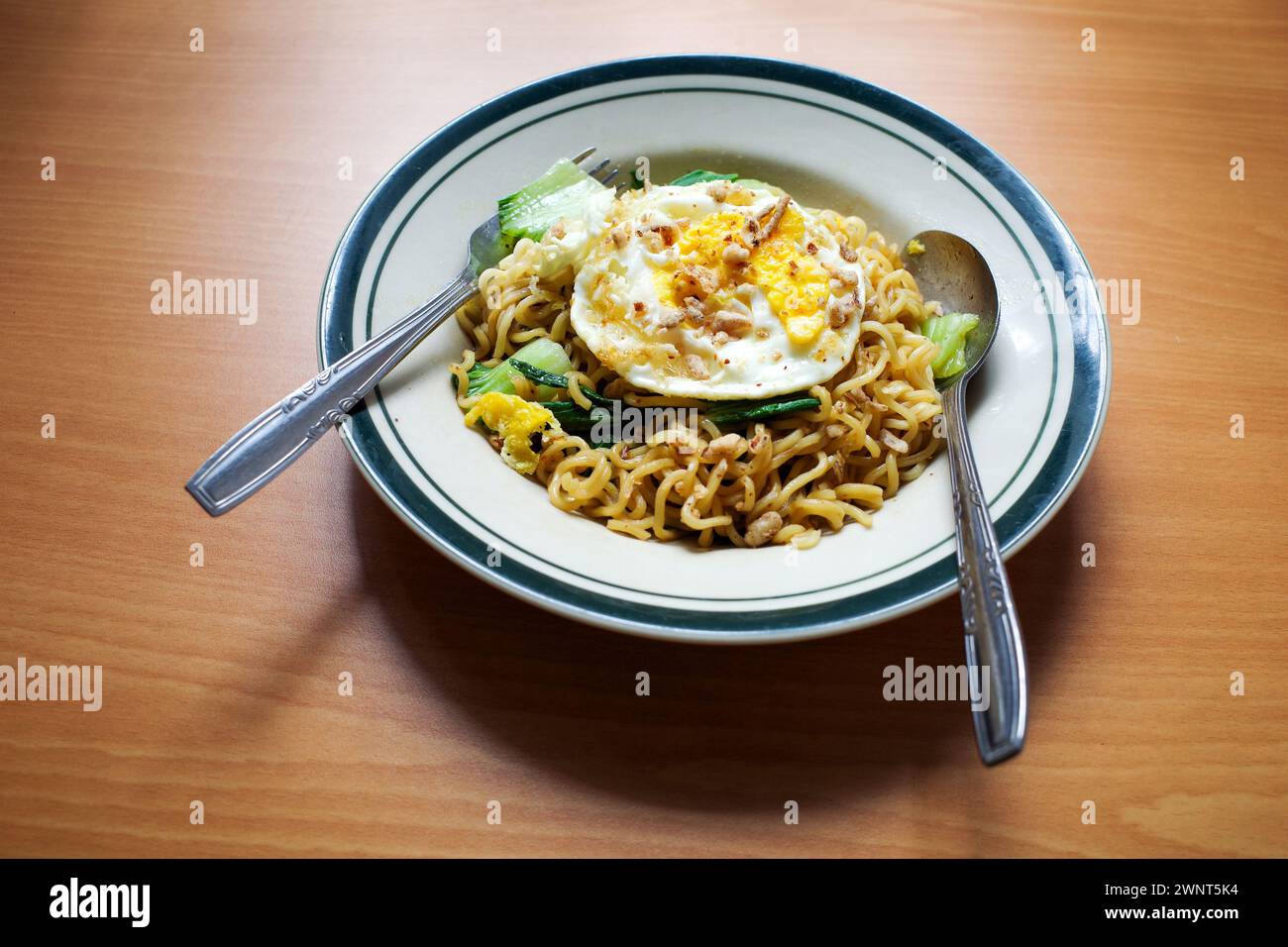 Mie Goreng Telor, Indonesian traditional street food, fried noodles ...