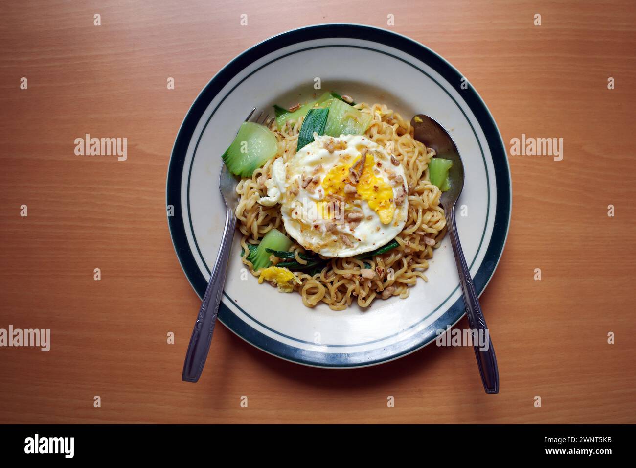 Mie Goreng Telor, Indonesian traditional street food, fried noodles ...