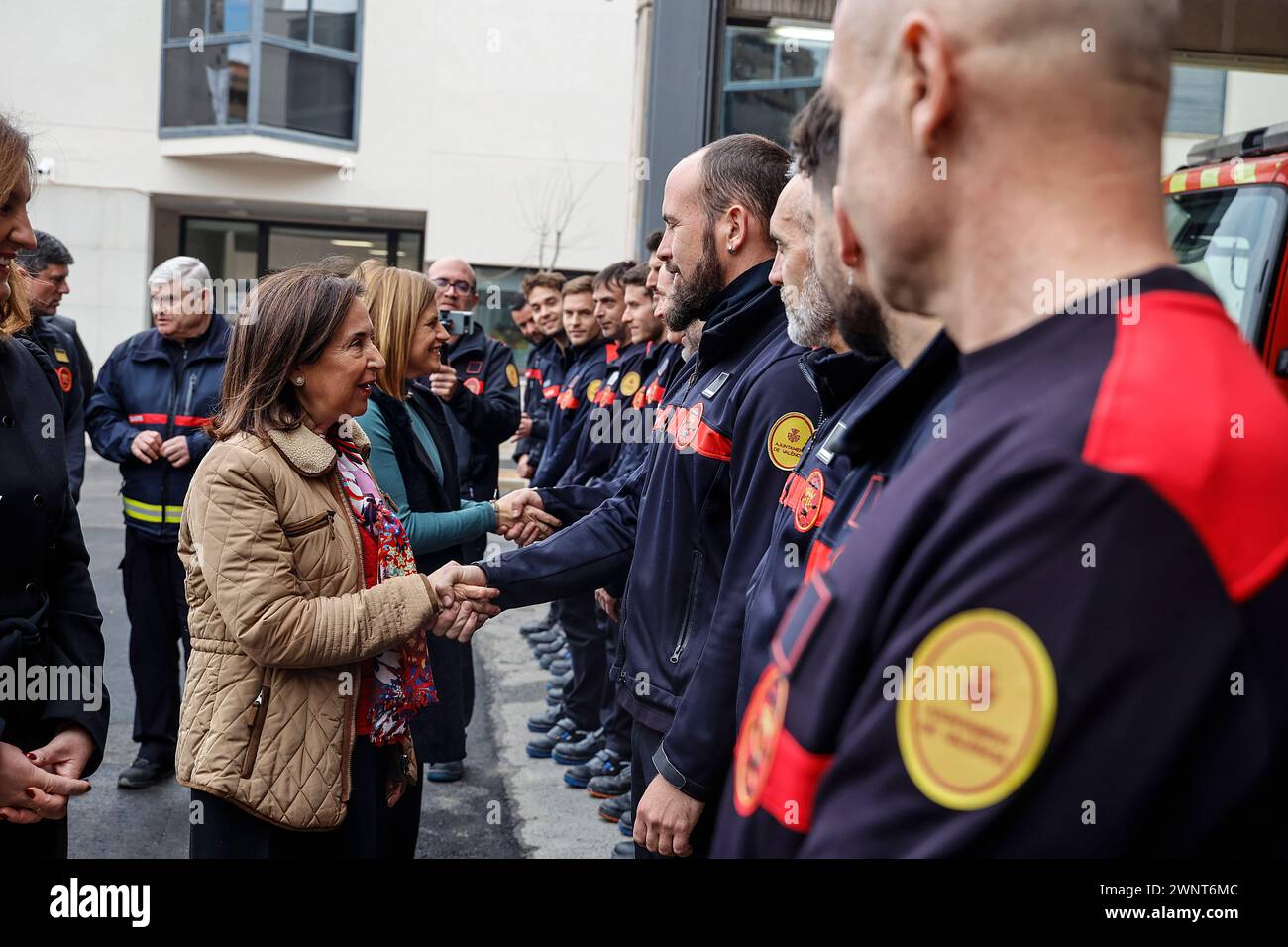 The Minister of Defense, Margarita Robles (1l), visits the personnel ...
