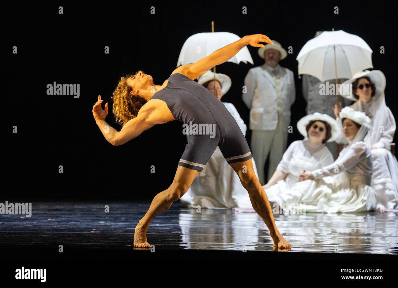 Tadzio (danced by Antony César) on the the Venice Lido beach, watched ...