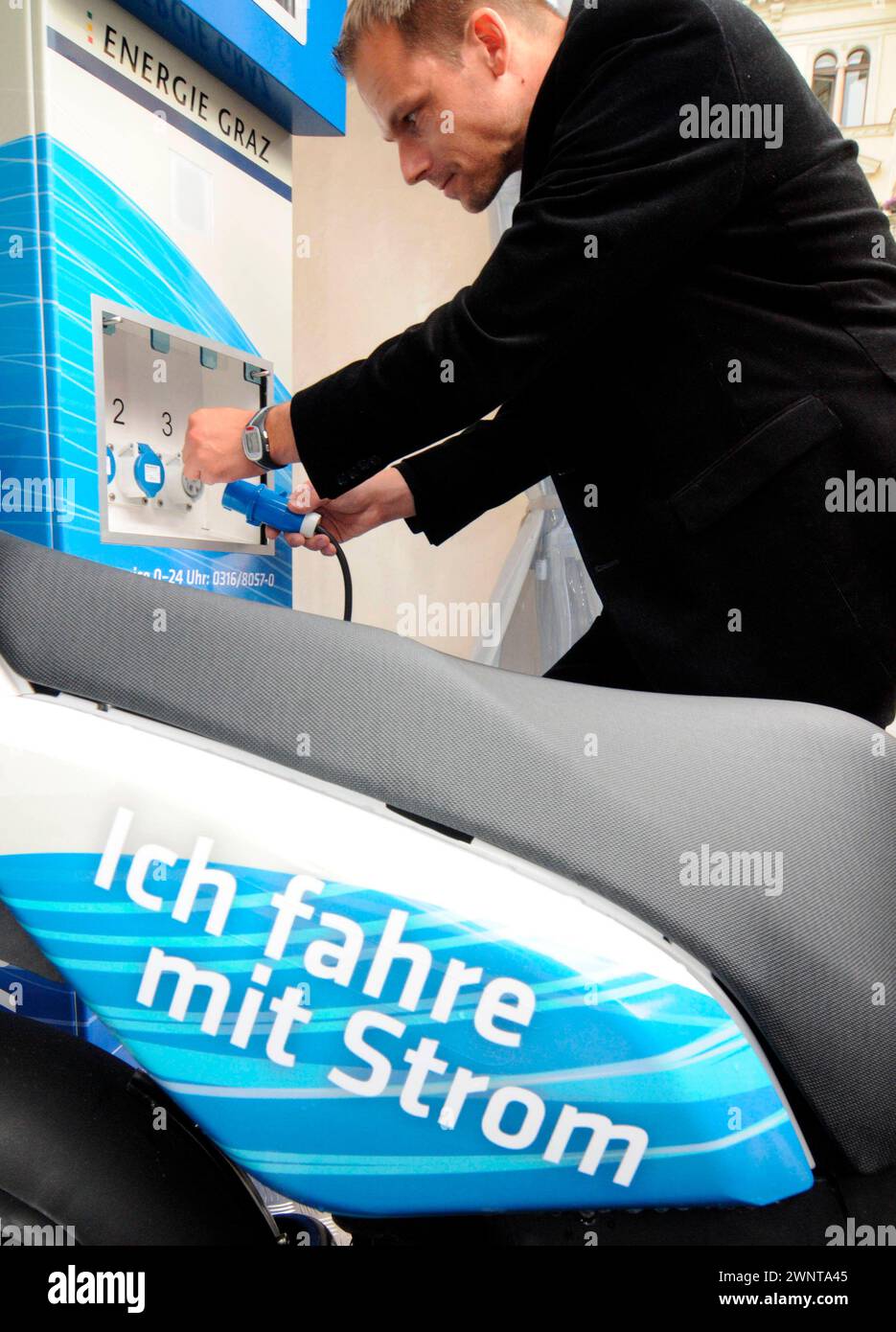 an e-bike charging at a charging station, electric vehicle and e ...