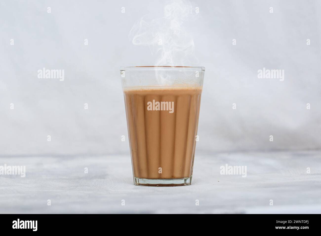 Fresh milk tea or Indian Kadak Chai Stock Photo - Alamy