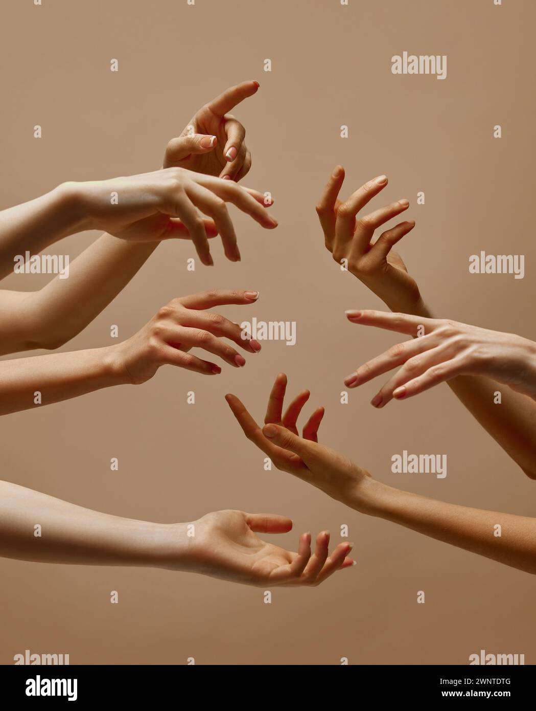 Female arms reaching to each other demonstrating sensitive and ...