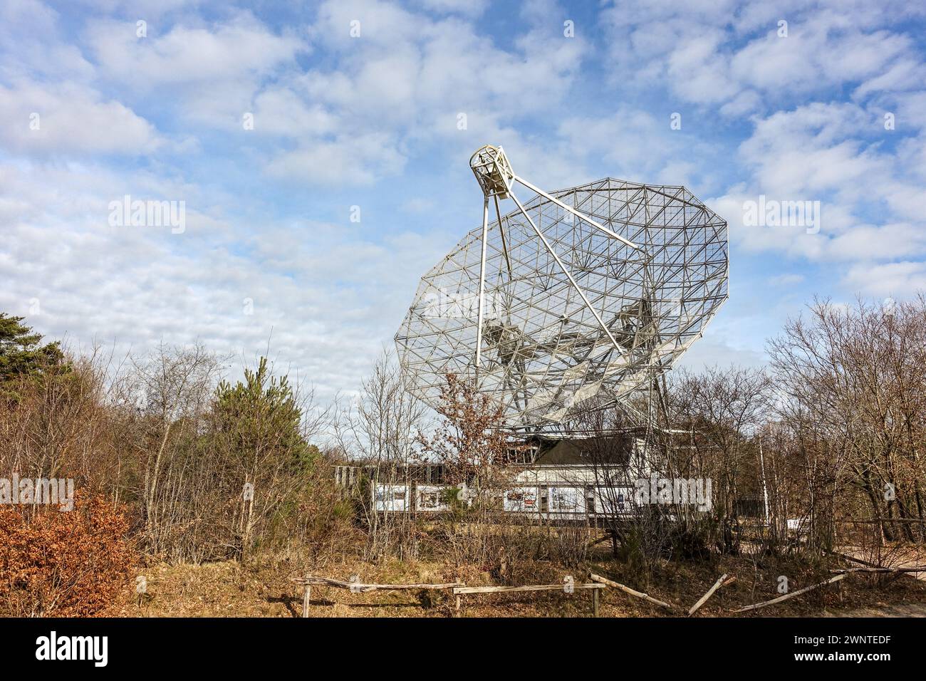 Large parabolic radio telescope (Radiotelescoop Dwingelderveld) amidst ...