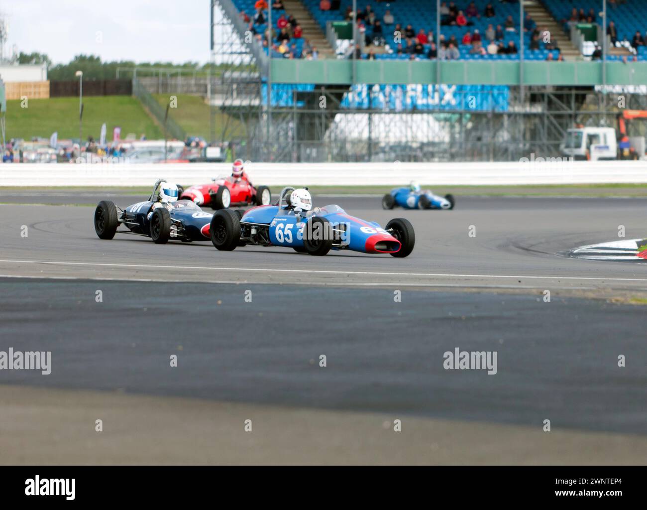 Racing action at the Loop, between a Donford FJ and a Lotus 20/22 ...