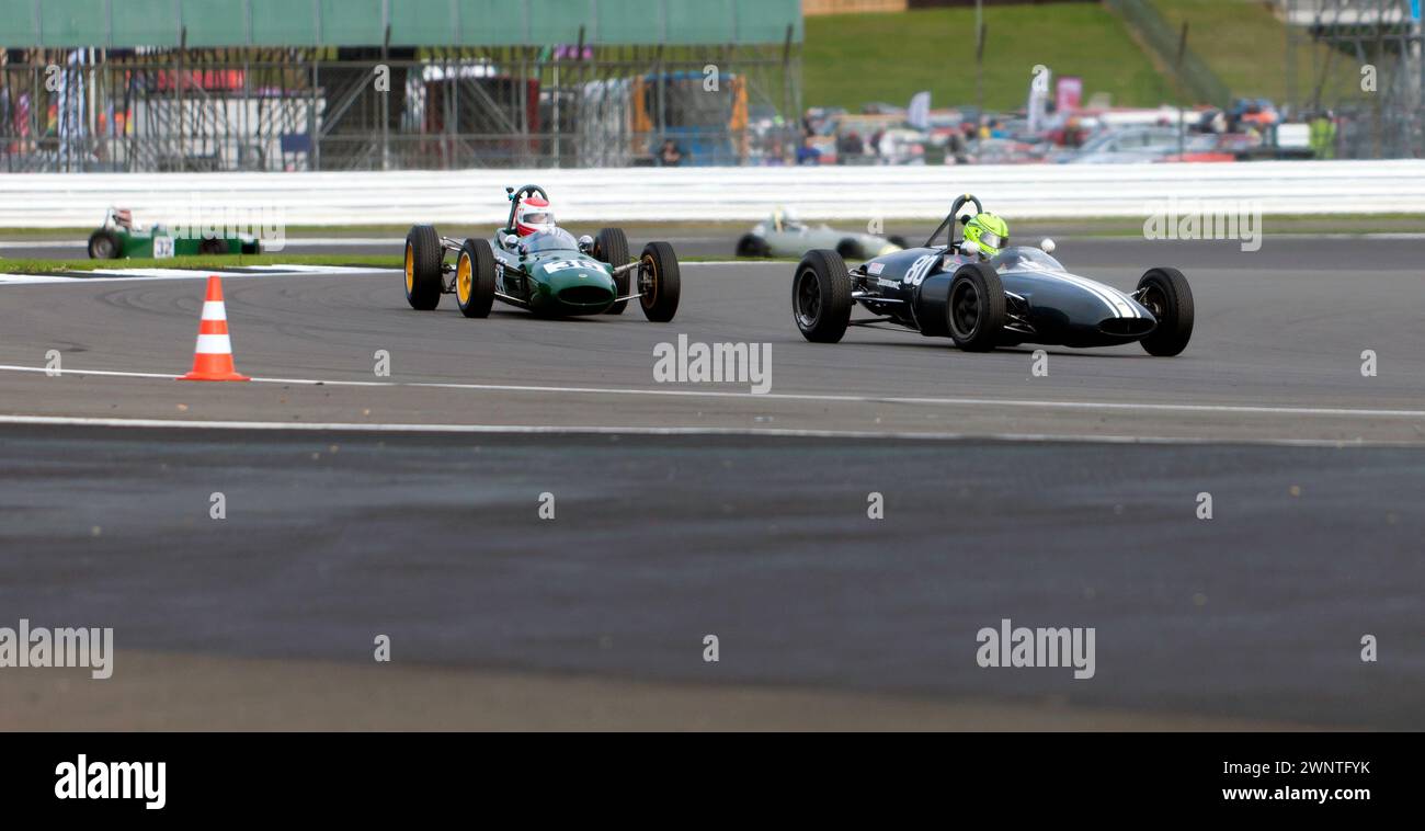 Racing action at the Loop, between a Lotus 20/22 and a Lotus 27, during ...