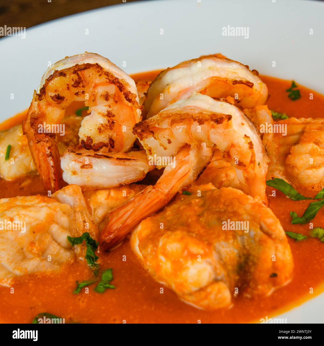 Recipe for Armorican-style monkfish tail, prawns, flambees with cognac ...